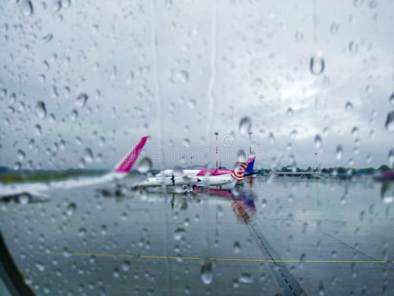 Rain at the Airport, the View from the Window of the Plane Editorial ...