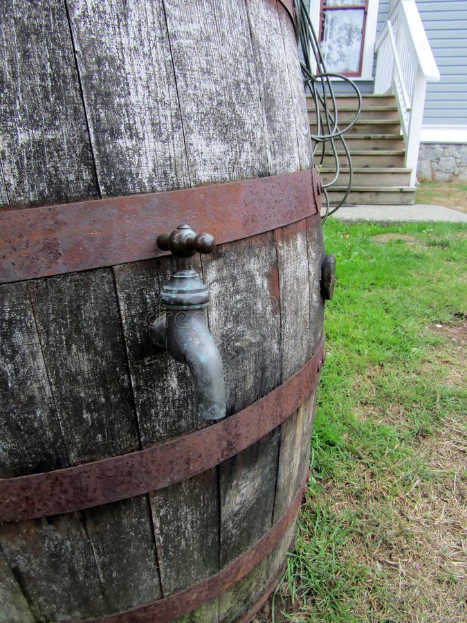 Modern Wooden Rain Barrel with Brass Spigot Used for Water Conservation ...