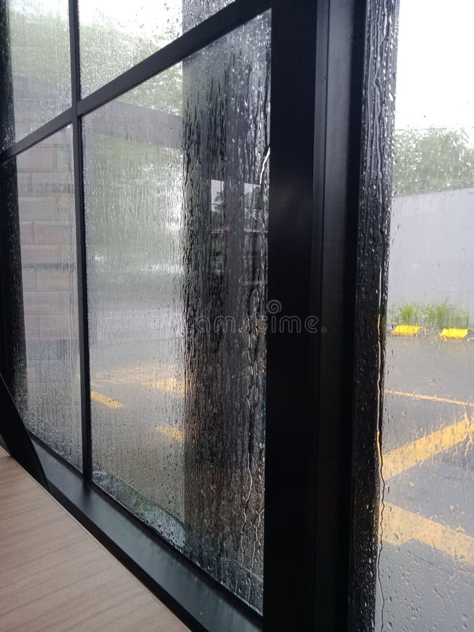 Rain behind the window stock photo. Image of rain, channeled - 283035890