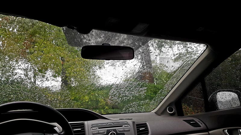 Rain on car window stock image. Image of inside, drop - 192050601