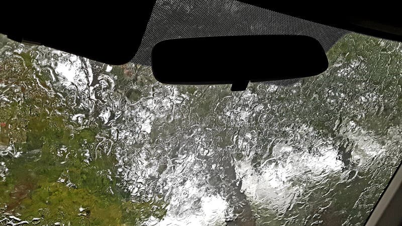 Rain on car window stock photo. Image of cloudy, windshield - 192050482