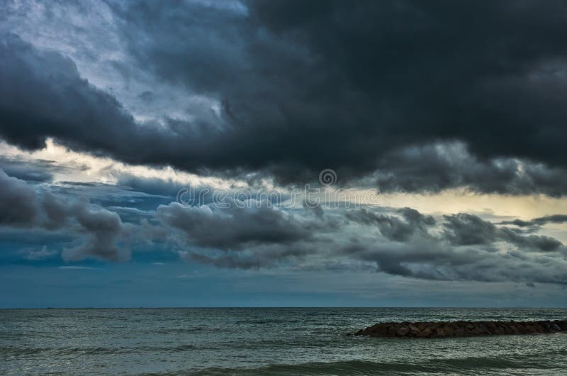 Rain cloud over the sea stock photo. Image of climate - 24469828