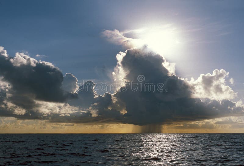 Rain Cloud and Shower Over the Ocean. Stock Image - Image of water ...