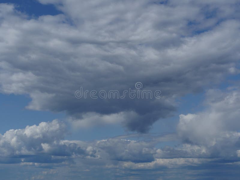 Rain clouds in blue sky stock photo. Image of space - 153711022