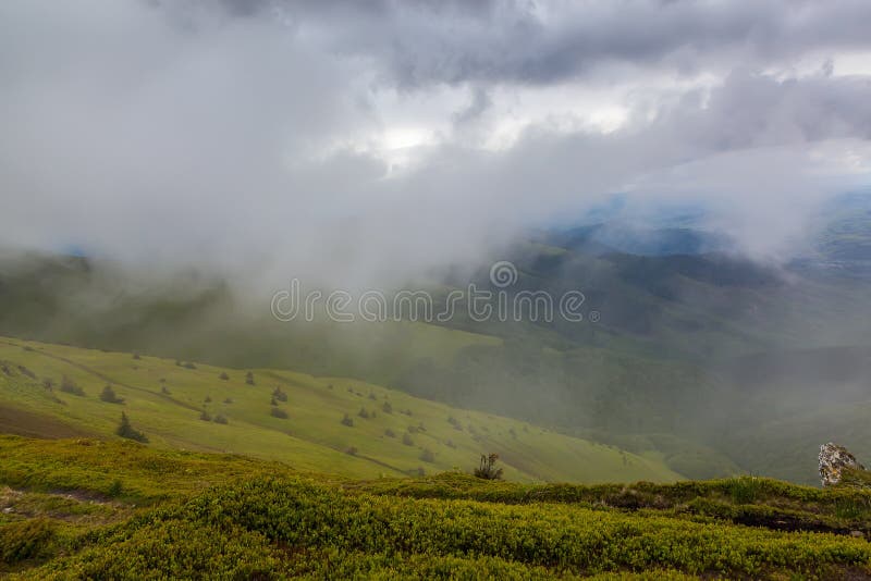 Rain Clouds on the Mountain Top Stock Photo - Image of outdoors, peak ...