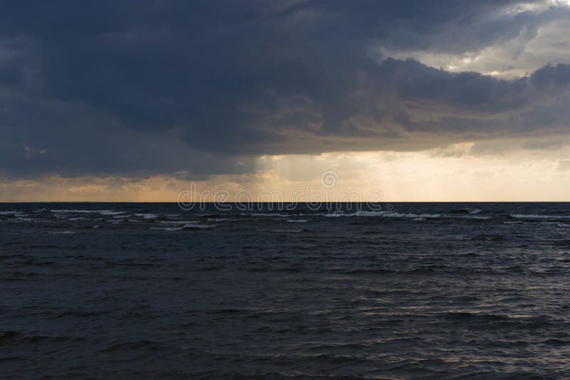 Rain Clouds Over Baltic Sea Near Shoreline Just before Sunset ...