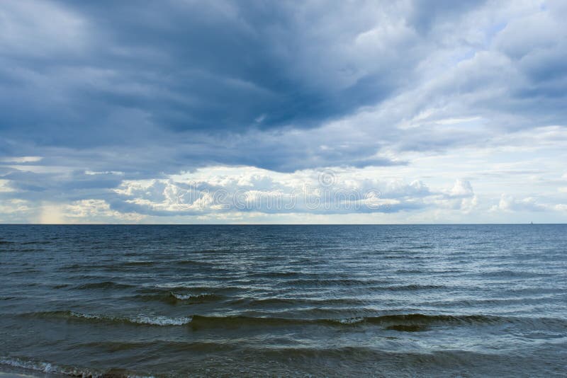 Rain Clouds Over Baltic Sea Near Shoreline before Sunset Stock Photo ...
