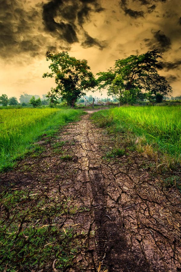 Rain Clouds Over Rural Road Landscape Stock Photo - Image of road ...