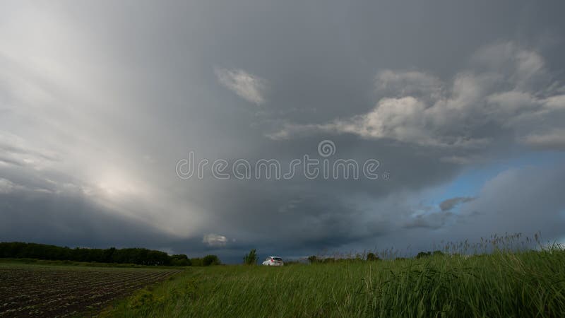 Rain Clouds are a Strip of Deciduous Forest and Green Grass at the Edge ...