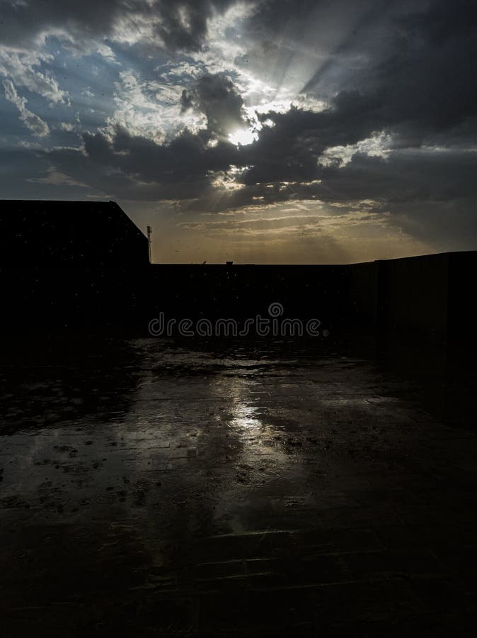 Rain clouds and sun stock photo. Image of rain, cold - 218339902