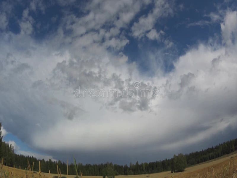 Rain Clouds in Clear Weather. the Onset of a Thunderstorm. Sunlight ...
