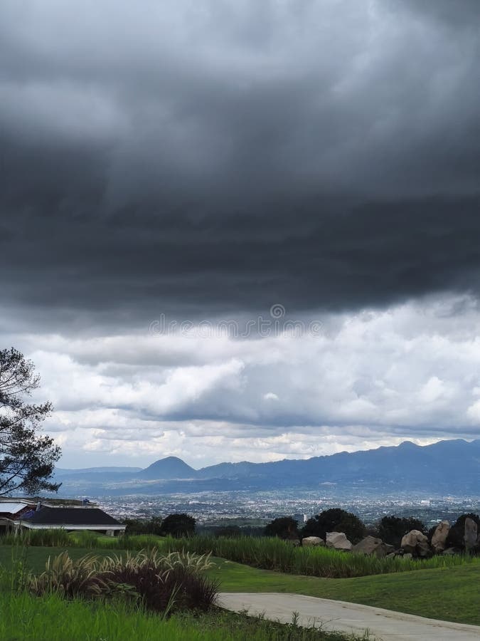 Before the Rain Comes, the Clouds Look Very Dark. Stock Image - Image ...