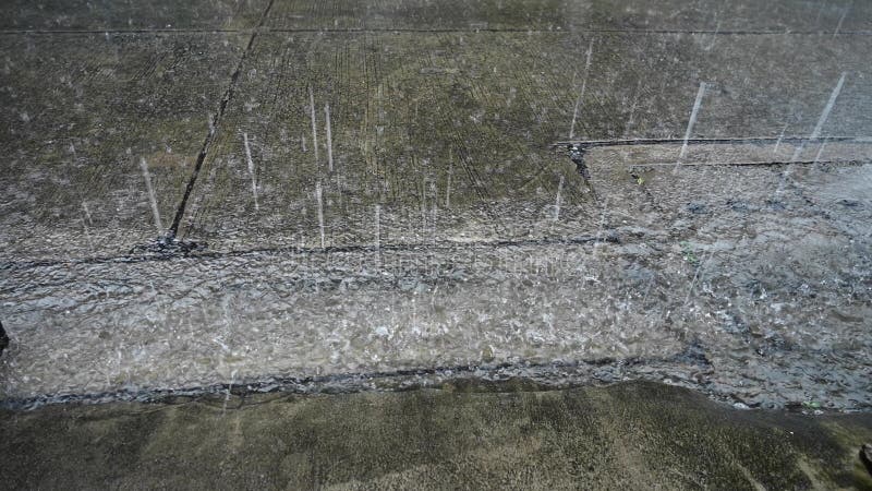 Rain on concrete stock video. Video of beautiful, rainy - 196225411