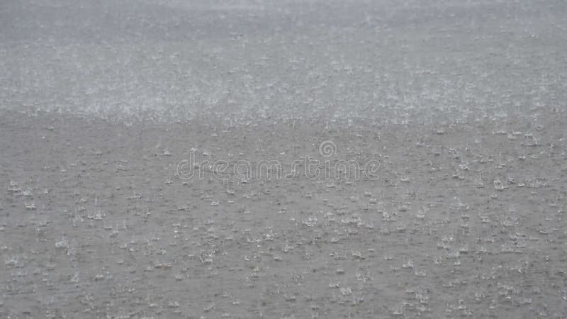 Rain on a concrete slab stock video. Video of closeup - 83630435