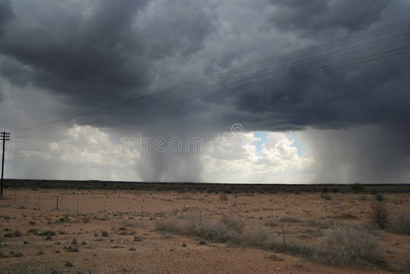 Rain in the Desert stock photo. Image of open, thunder - 209422