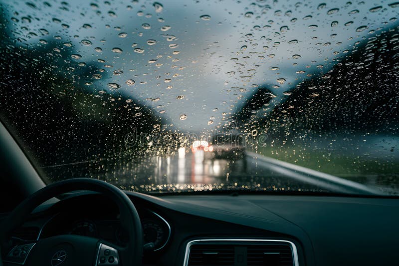 Rain Drizzle on Windshield in Evening, Driving in Bad Weather Stock ...