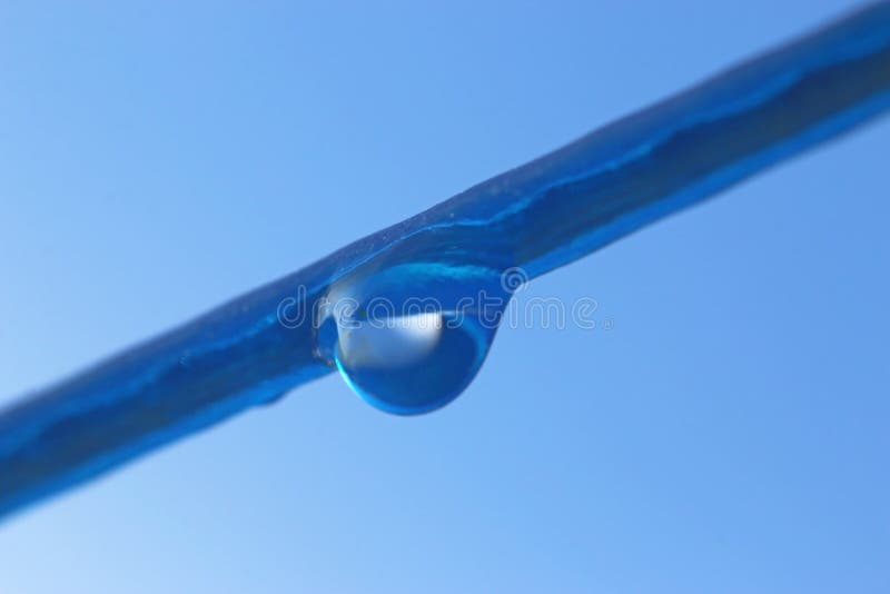 Rain Drop on a Blue Washing Line Stock Image - Image of rain, blue ...