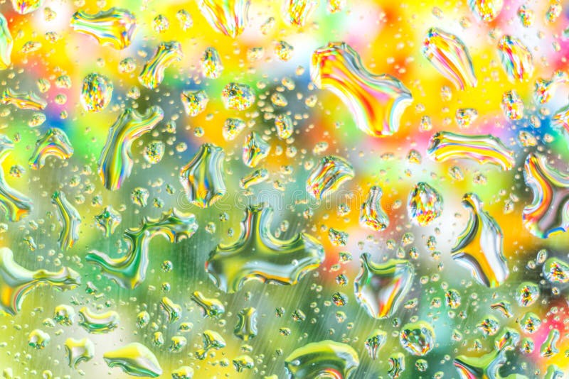 Rain drop stock image. Image of rainbow, macro, reflections - 76715583