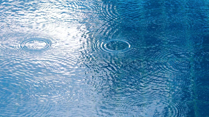 Rain Drop on the Surface of Swiming Pool. Stock Image - Image of circle ...