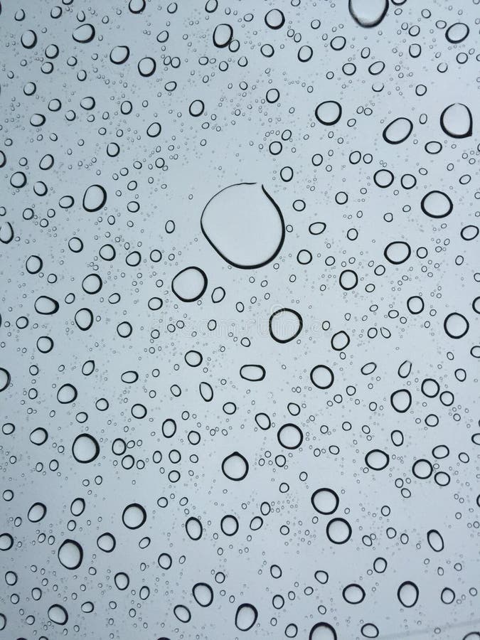 Rain Bubble in a Puddle on a Mat. Stock Photo - Image of rain, bubble ...