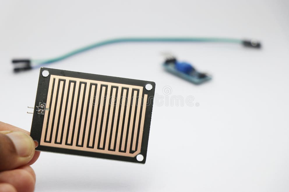 Rain Drop Sensor Module Used To Detect Water Drops Isolated on White ...