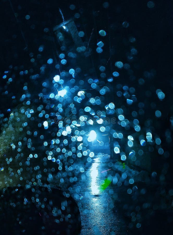 Rain Droplets Captured at Night. Stock Image - Image of water, light ...