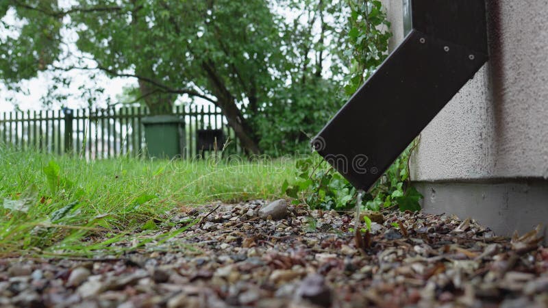 Rain Droplets Draining from a Gutter Stock Video - Video of courtyard ...