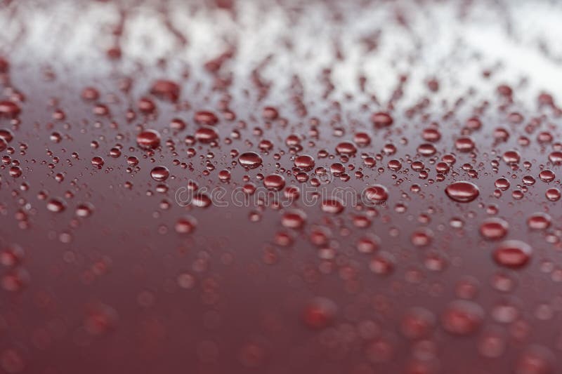 Rain Droplets on Red Sports Car Surface with Hydrophobic Treatment ...
