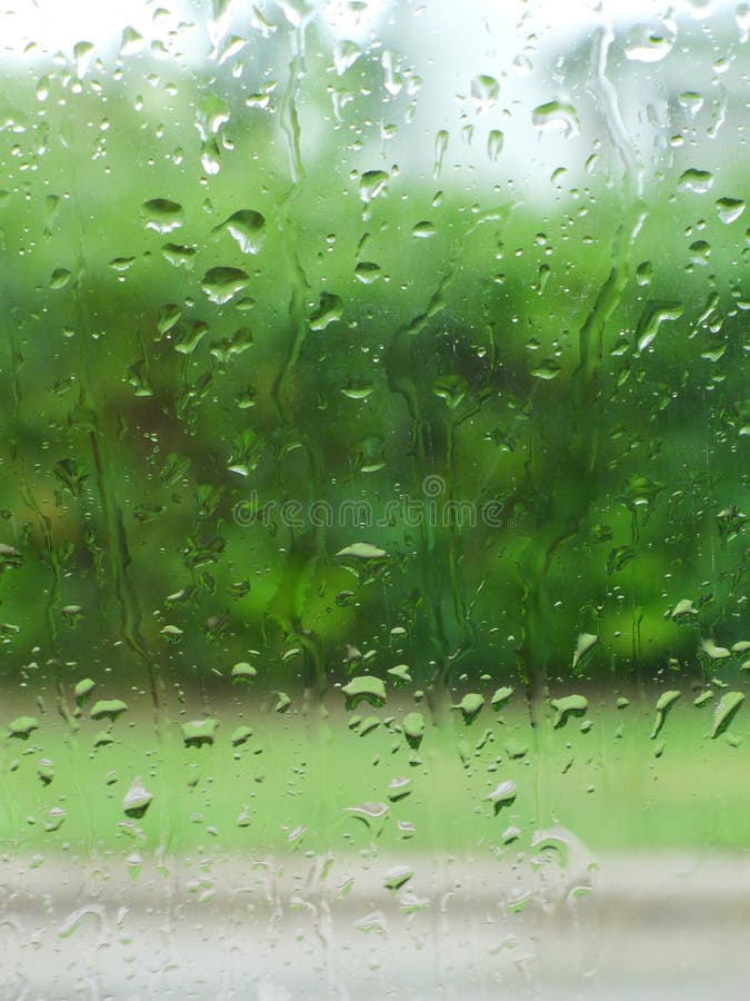 Rain Droplets Running Down a Window Closeup Stock Photo - Image of ...