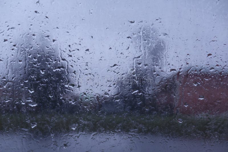 Rain Droplets on Window with Out of Focus Background Stock Photo ...