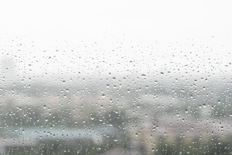 Rain Droplets on Window with Out of Focus Background Stock Photo ...