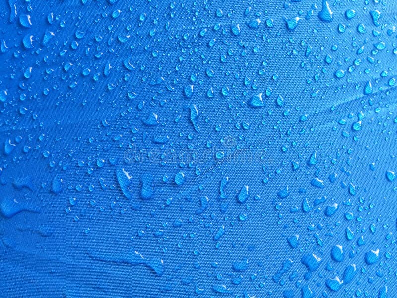 Rain drops blue stock photo. Image of blue, rain, ocean - 216918770