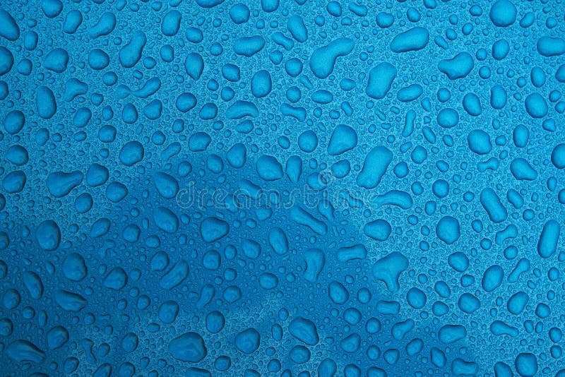 Rain Drops on a Blue Smooth Surface. Stock Photo - Image of macro ...