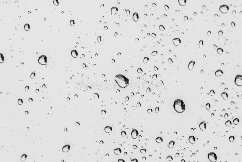 Rain drops on clear window stock photo. Image of sparse - 150882352