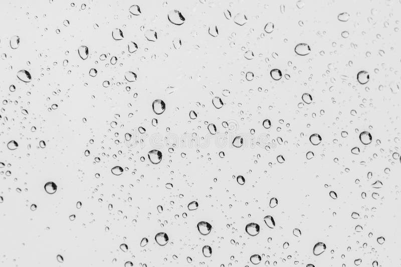 Rain drops on clear window stock photo. Image of sparse - 150882352