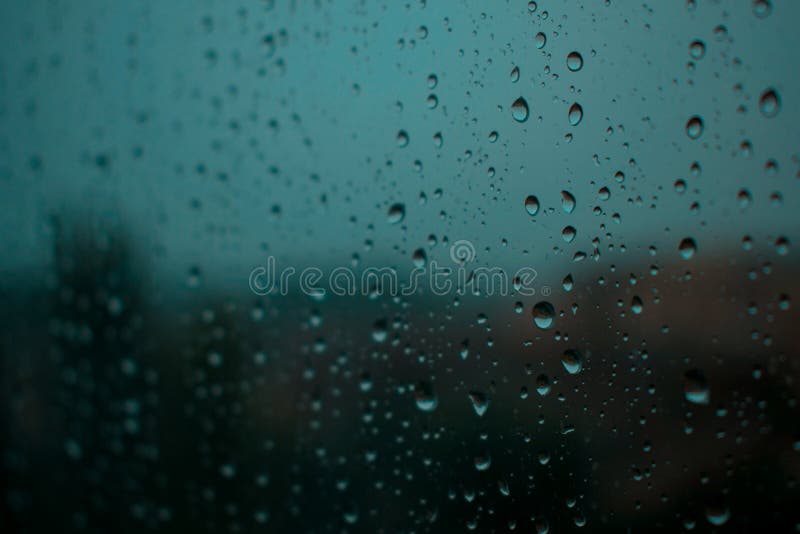 Rain Drops on a Crystal Window at the Evening with Trees and Sky ...