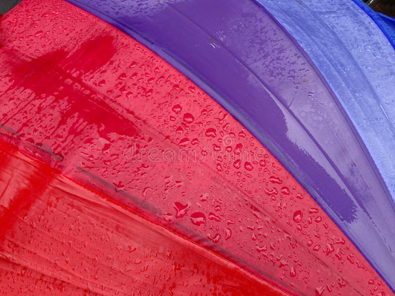 Rain Drops Falling Onto Umbella with Rainbow Colour Stock Image - Image ...