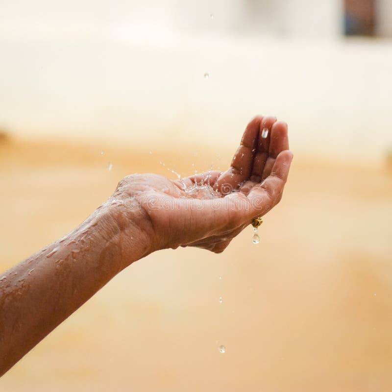Rain drops falls in hand stock image. Image of falls - 91784957