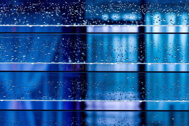 Rain drops on glass panel stock image. Image of season - 250030095