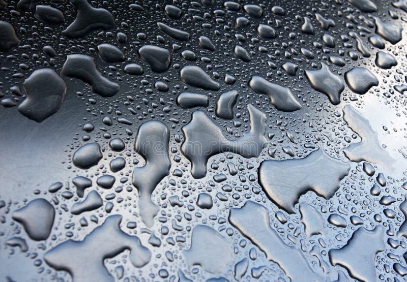 The Rain Drops on a Metal Surface Stock Photo - Image of liquid ...