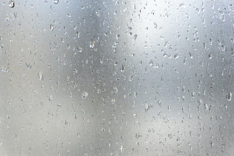 Raindrops on gray metal stock image. Image of liquid - 174545041