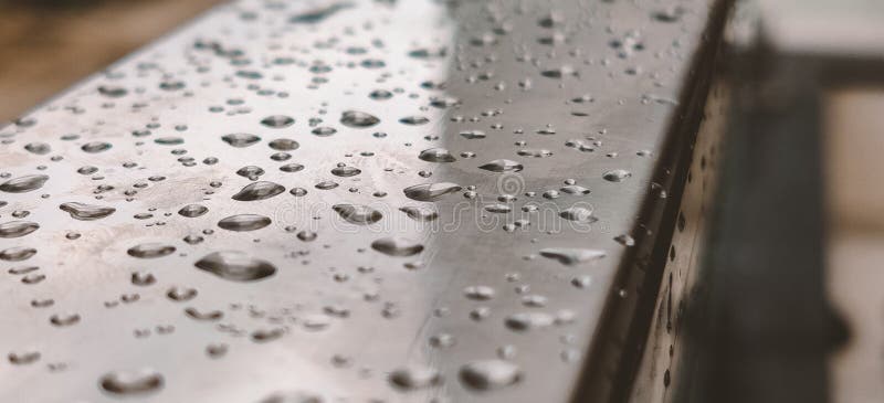 Rain drops on metals stock image. Image of drops, metals - 157586651