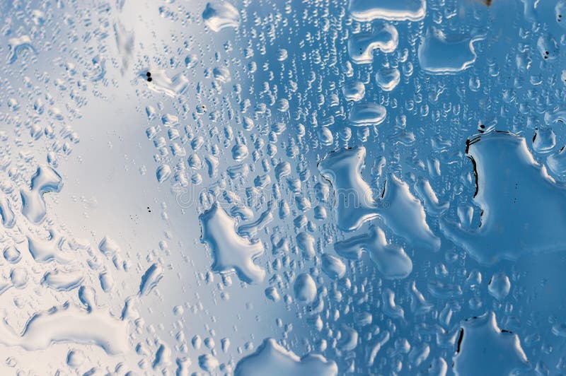Rain Drops on a Mirror Left Outside. Stock Image - Image of splash ...
