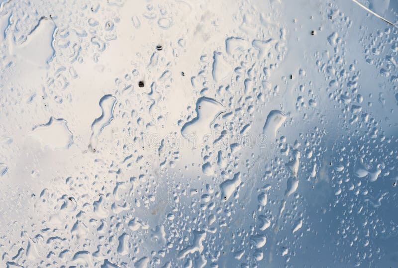 Rain Drops on a Mirror Left Outside. Stock Image - Image of splash ...