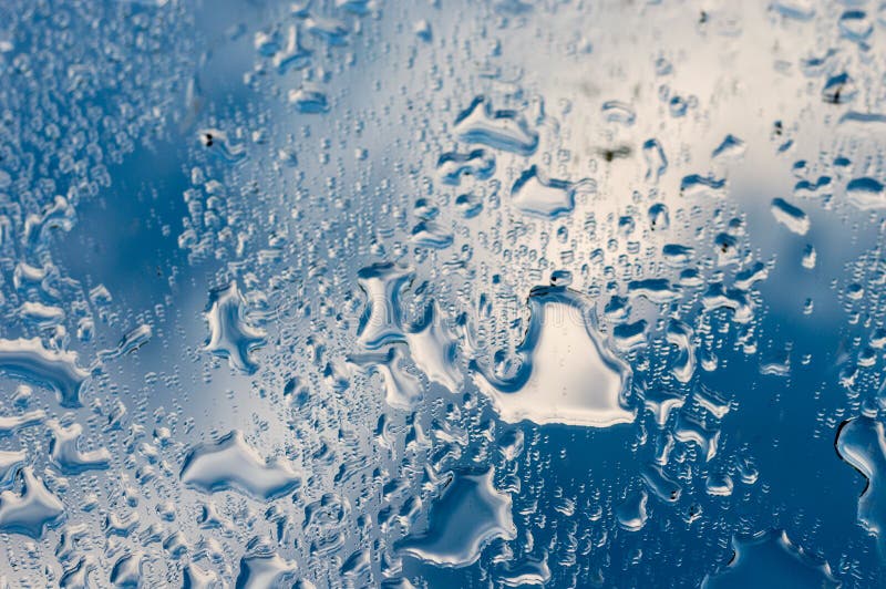 Rain Drops on a Mirror Left Outside. Stock Photo - Image of rain ...