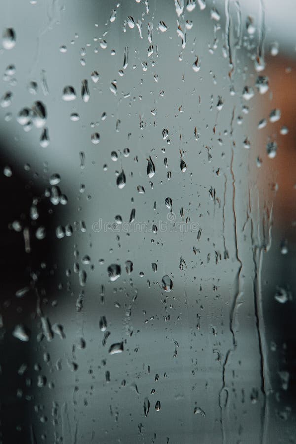 Rain Drops Over the Crystal of a Window during a Sad Day Stock Photo ...