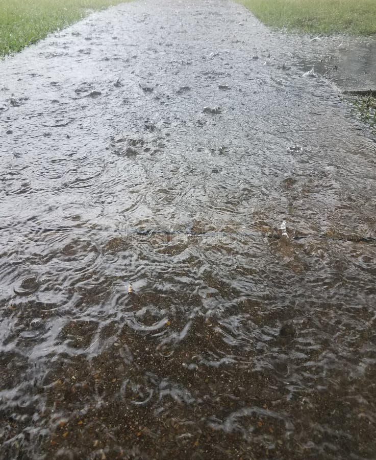 Rain Drops on Pavement and Sidewalk Stock Photo - Image of rainstorm ...