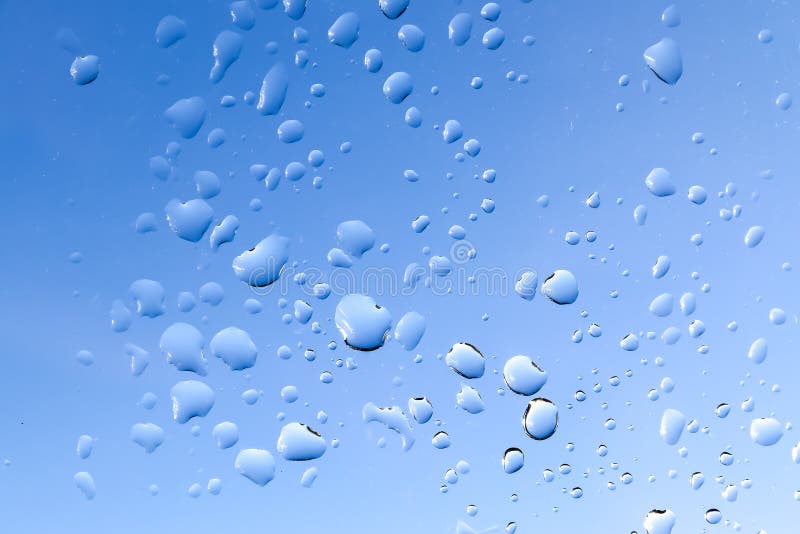 Rain Drops Running Down a Window in a Close Up View Stock Photo - Image ...
