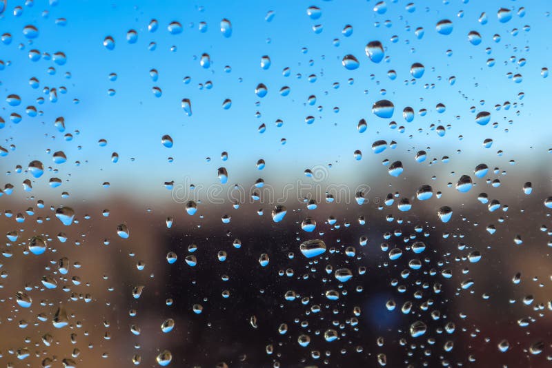 Rain Drops Running Down a Window in a Close Up View Stock Photo - Image ...