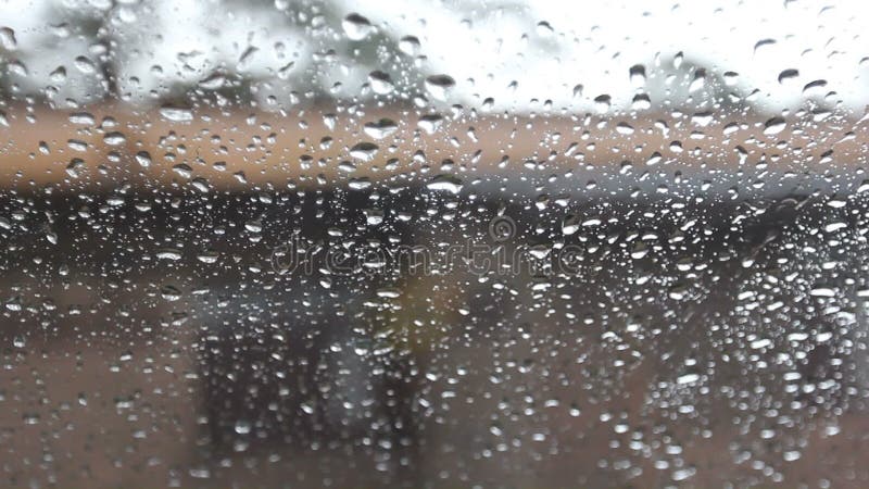 Rain Drops Running Down a Window,Rainy Day Stock Video - Video of light ...